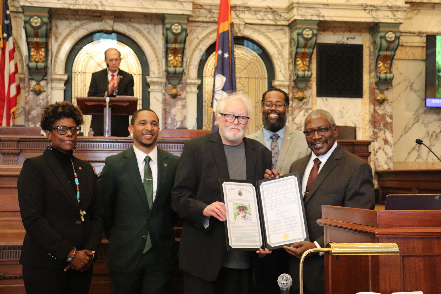 Receives Senate Resolution