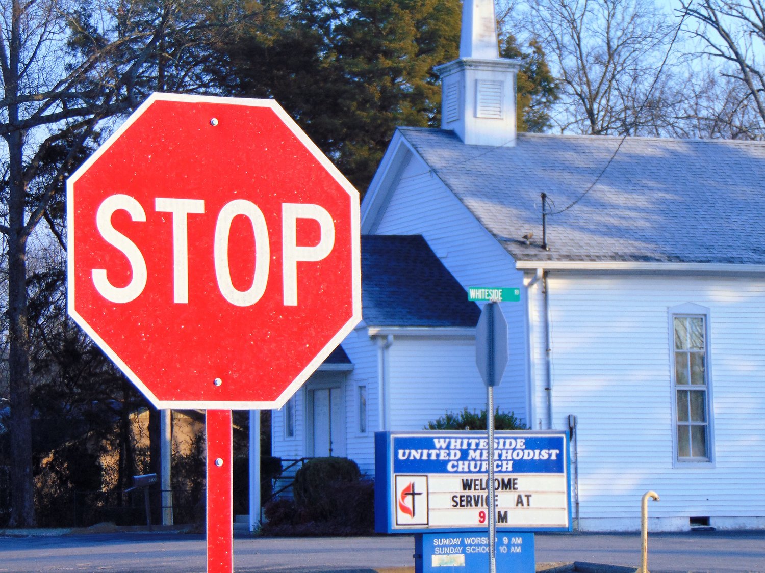 NEW 3-WAY STOP AT MIDLAND - Shelbyville Times-Gazette